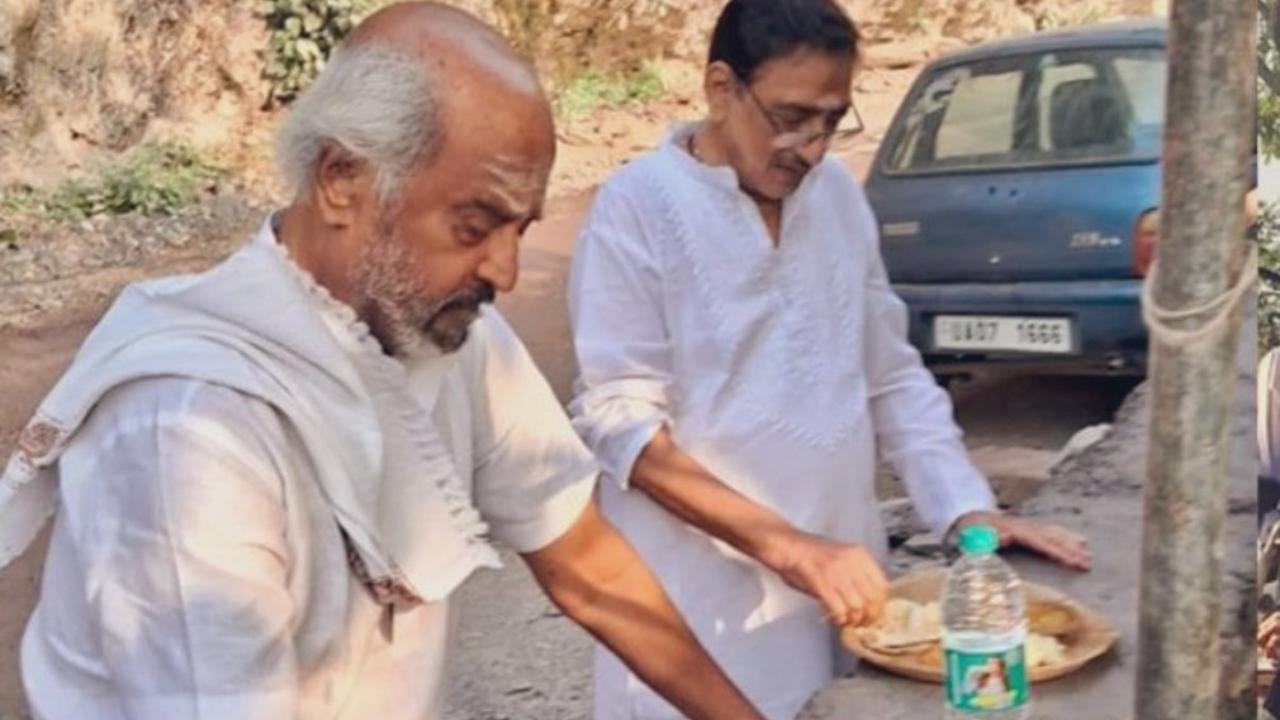 Rajinikanth enjoys food from pattal on roadside during his trip to ...